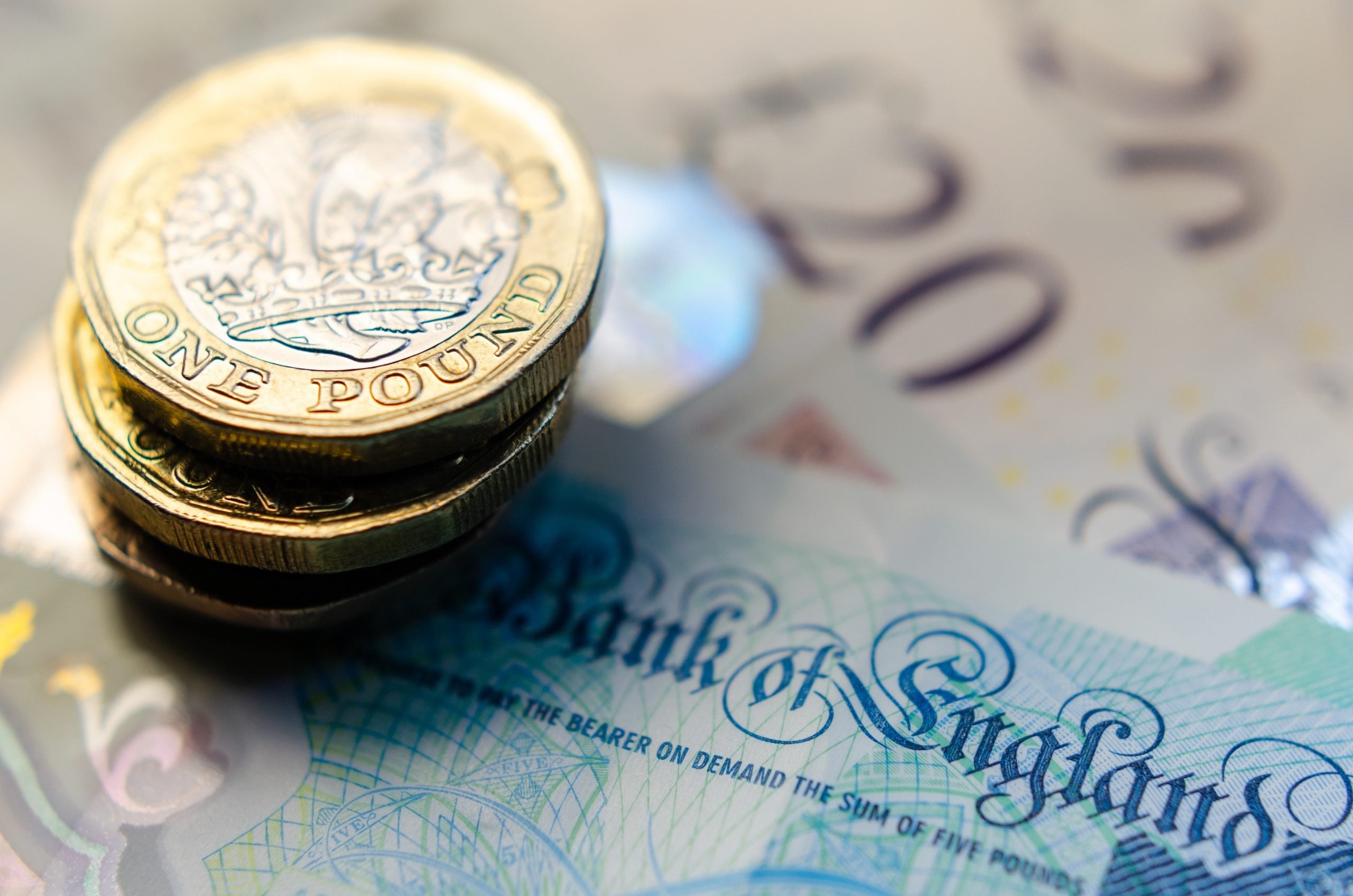 British pound steady after mixed PMIs